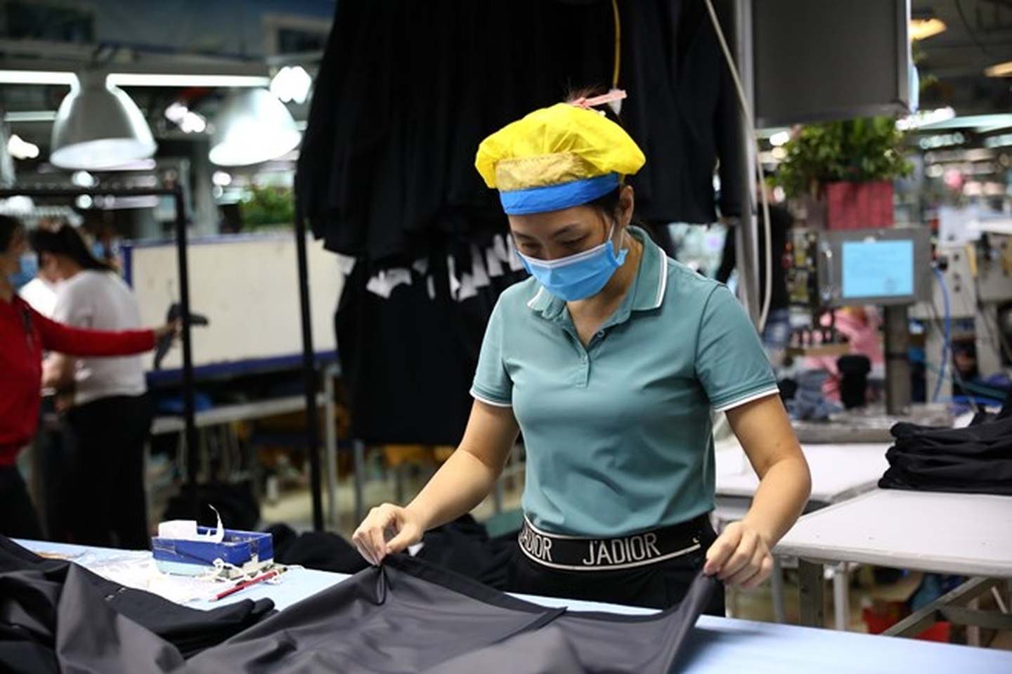 Garment firms lay off thousands amid losses